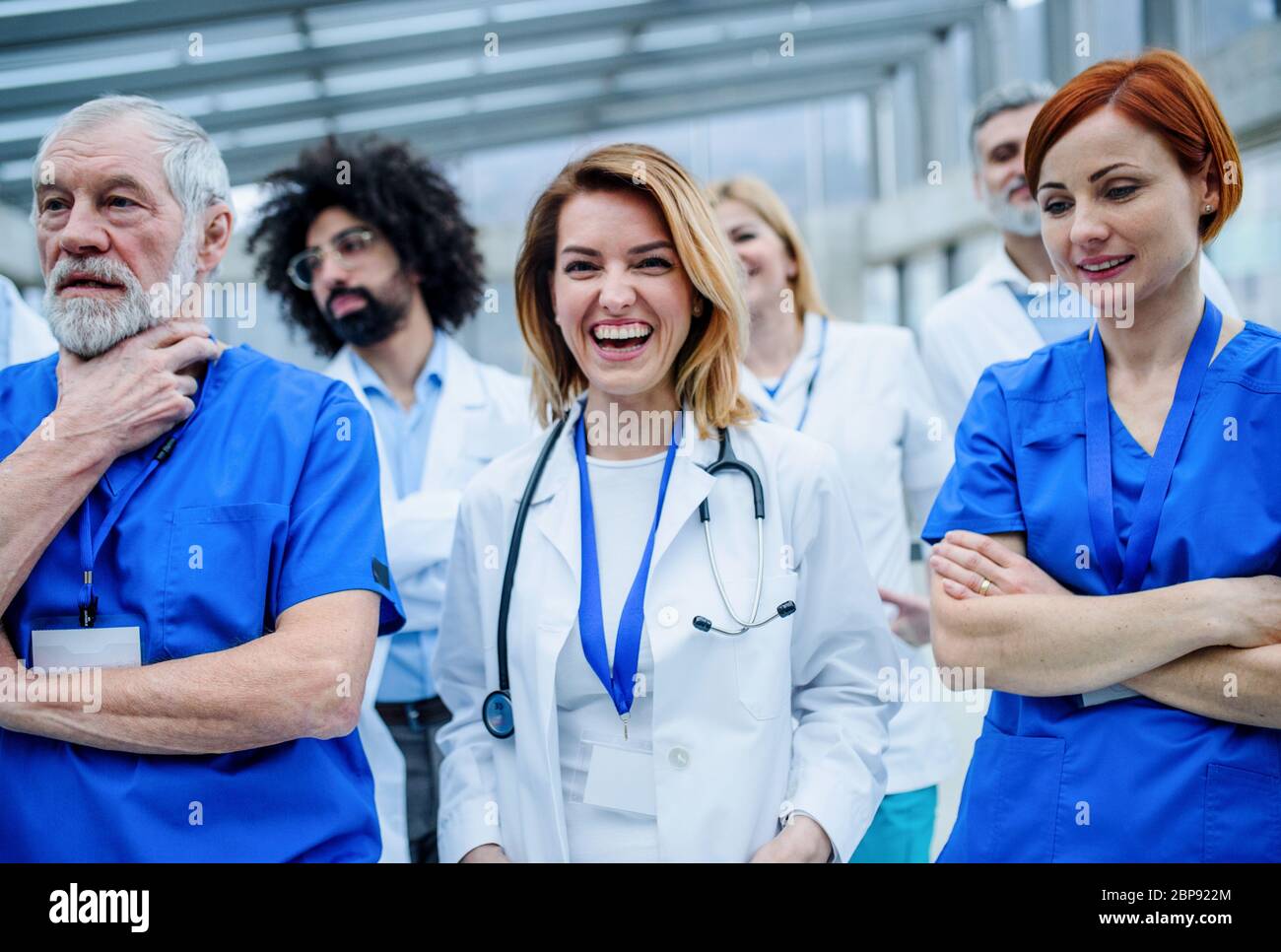 Doctors talking and laughing hi-res stock photography and images - Alamy