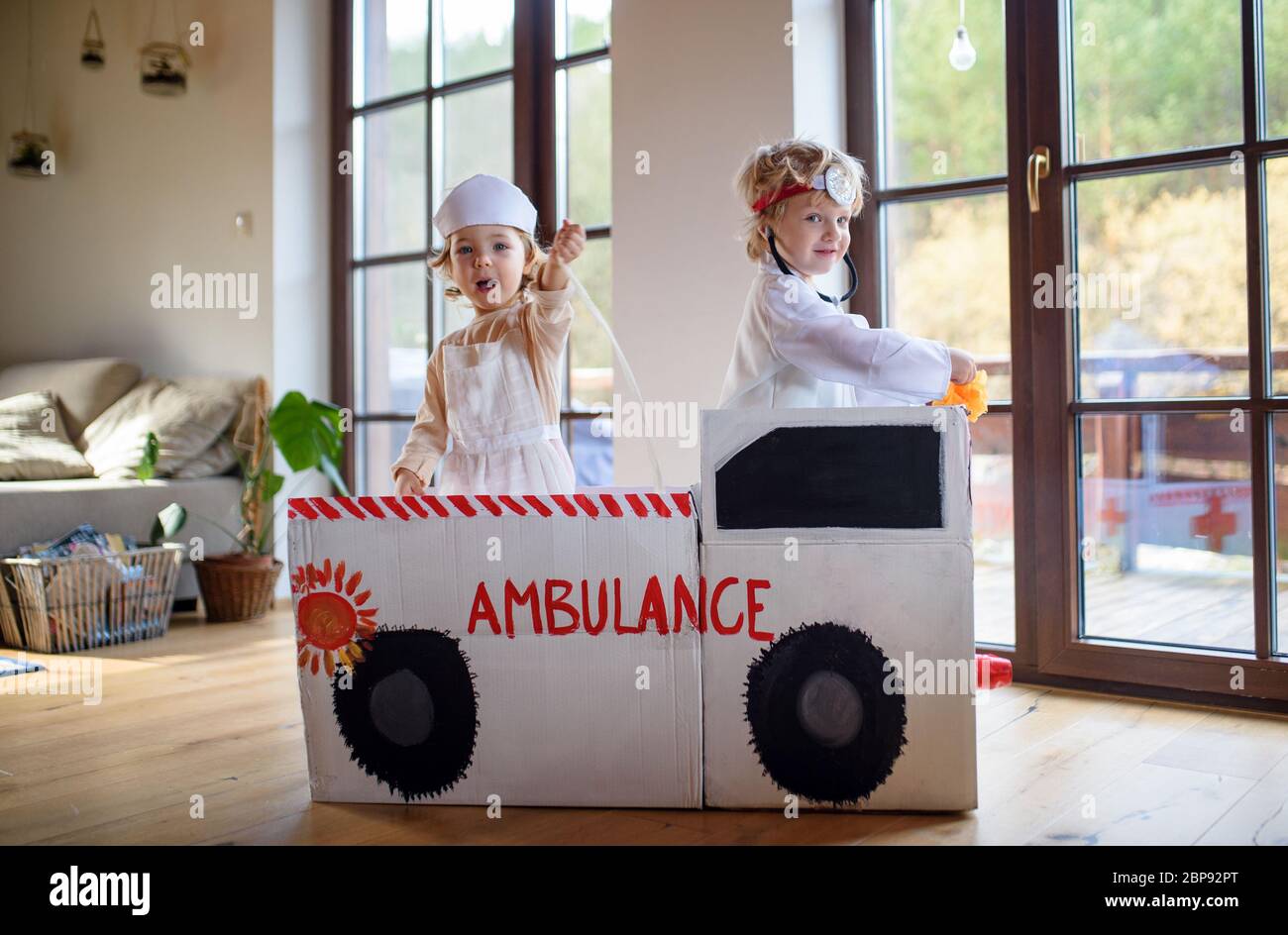 Brother sister playing doctor stethoscope hi-res stock photography and ...