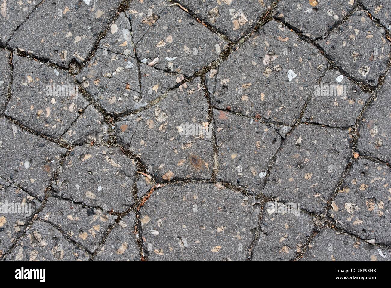 broken tarmac - road texture, background Stock Photo - Alamy
