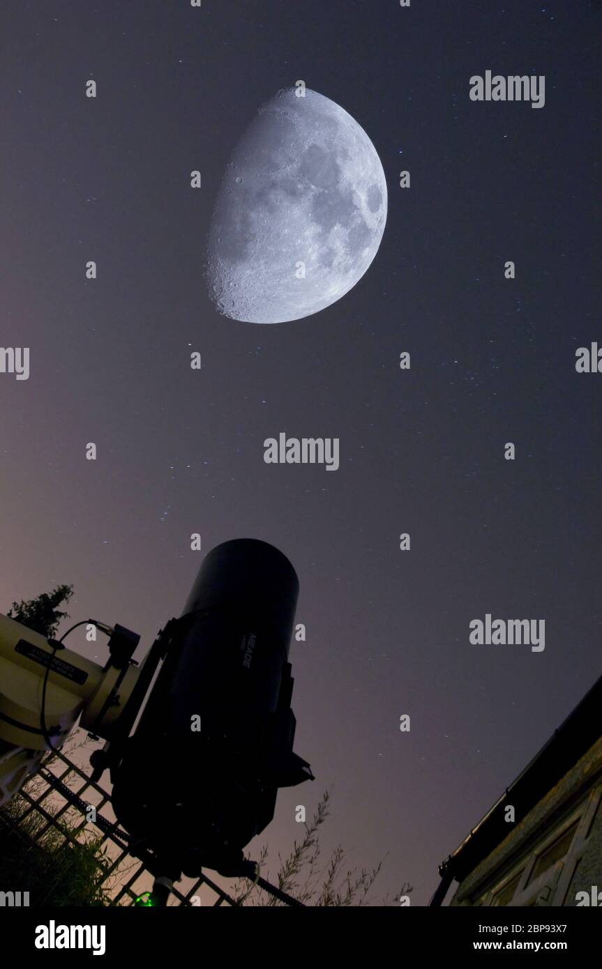 Large telescope on equatorial mount pointing at the moon Stock Photo ...
