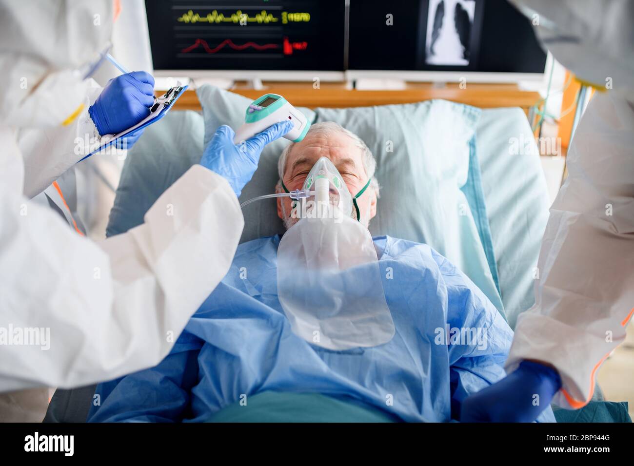Infected patient in quarantine lying in bed in hospital, coronavirus ...