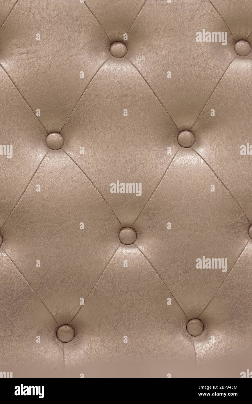 Highly detailed texture of golden beige vintage padded leather cloth ...