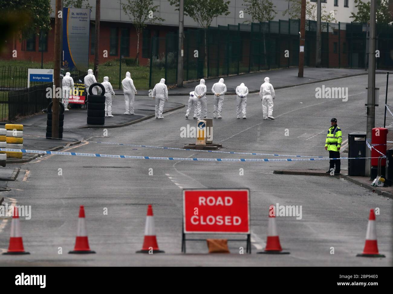 Police officers at the scene on King Street, Blackburn, following the ...