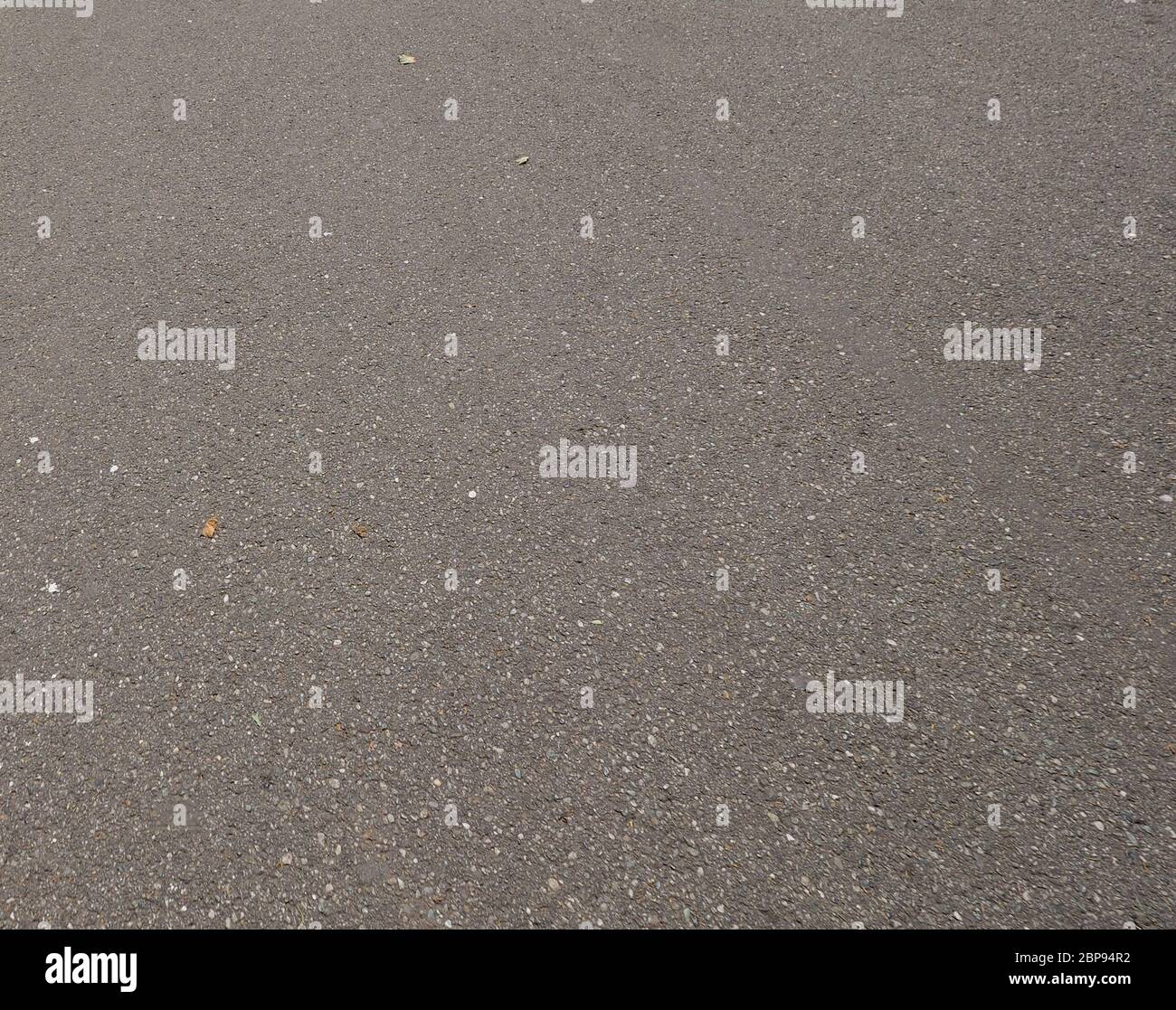 grey tarmac texture useful as a background Stock Photo - Alamy