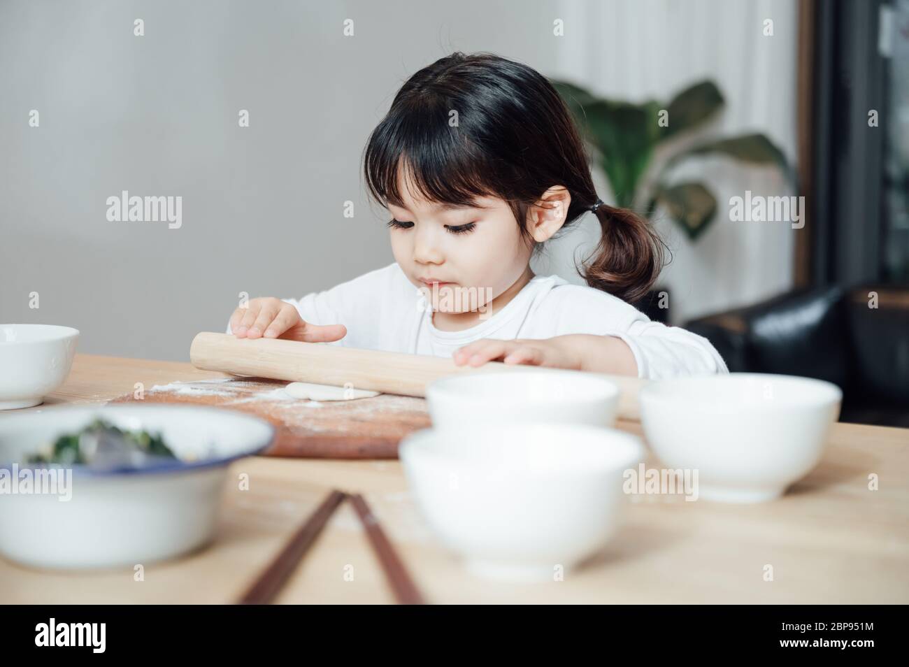 The little girl dumplings Stock Photo - Alamy