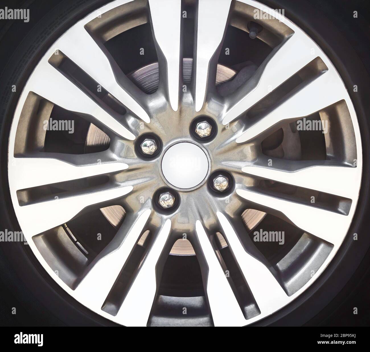Detail of a car alloy rim background Stock Photo - Alamy