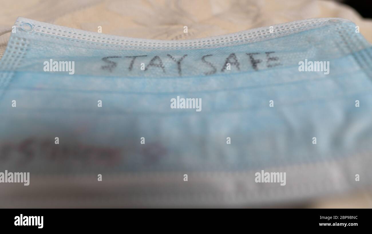 Face mask with a personal handwritten message 'stay safe' | virus ...