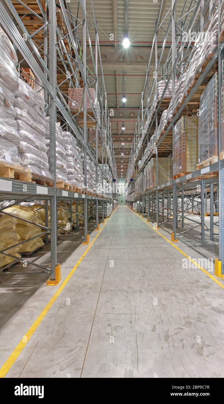 Long Aisle Row Storage in Distribution Warehouse Stock Photo - Alamy