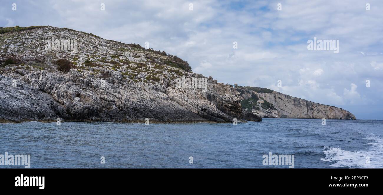 Coastline cliffs near Blue Caves as seen from a tourist boat, Zante ...