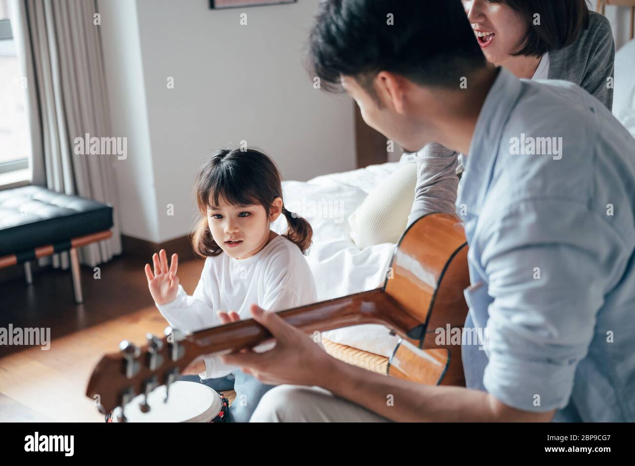 Singing at home with children hi-res stock photography and images - Alamy
