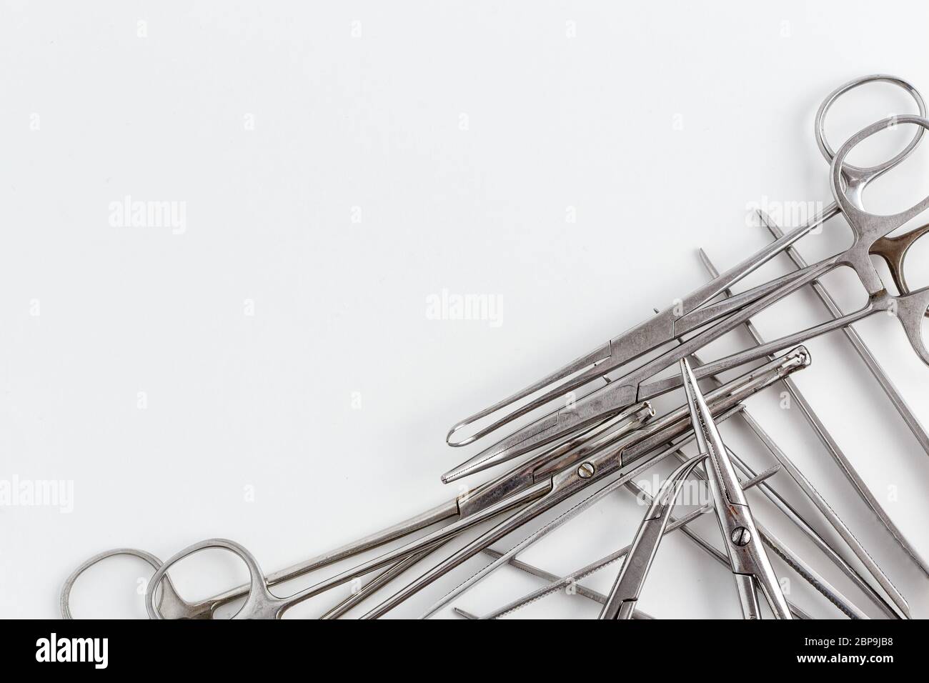 surgical instruments on white isolated background. top view Stock Photo ...
