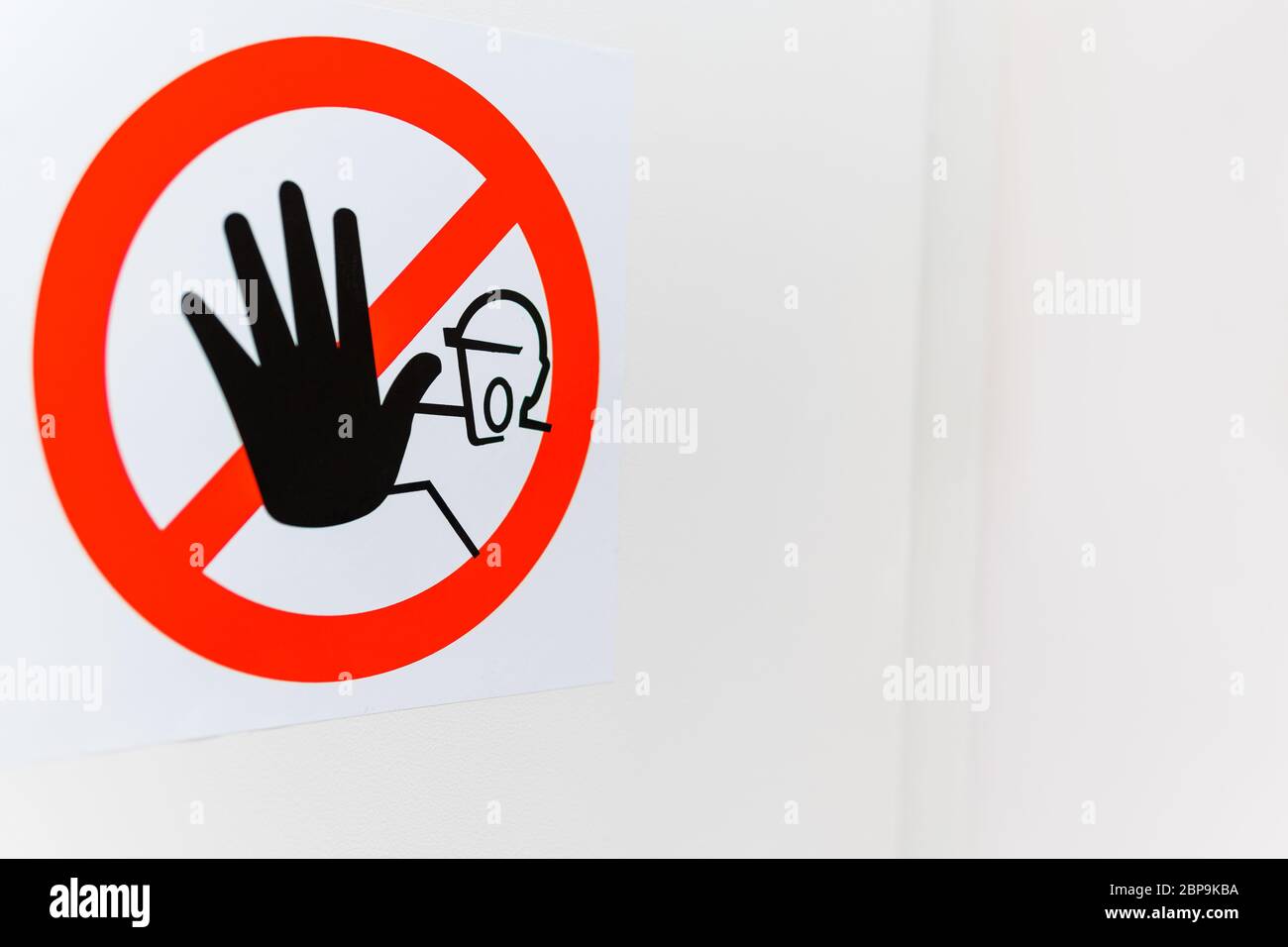 Do not Enter the Symbol Sign, photo on the white wall. Label, no entry ...