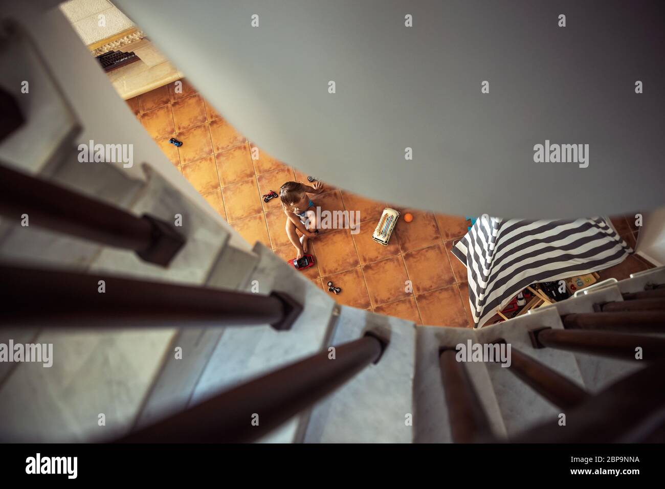 Children playing on stairs hi-res stock photography and images - Alamy