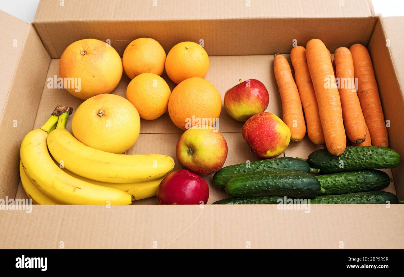 Donation cardboard box with fruits and vegetables Stock Photo - Alamy