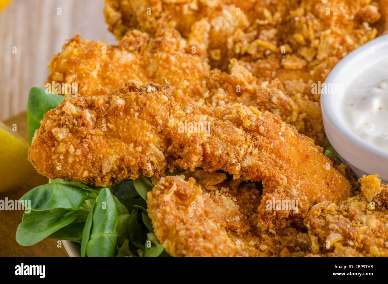 Chicken strips with delish garlic dip, food photography Stock Photo - Alamy