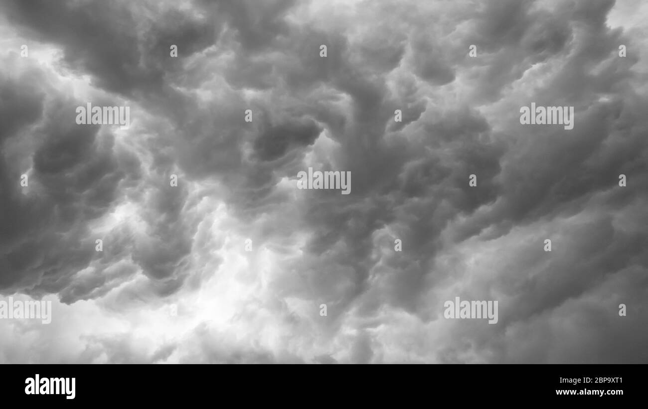 Dark ominous stormy cloudy sky Black and White Stock Photos & Images ...