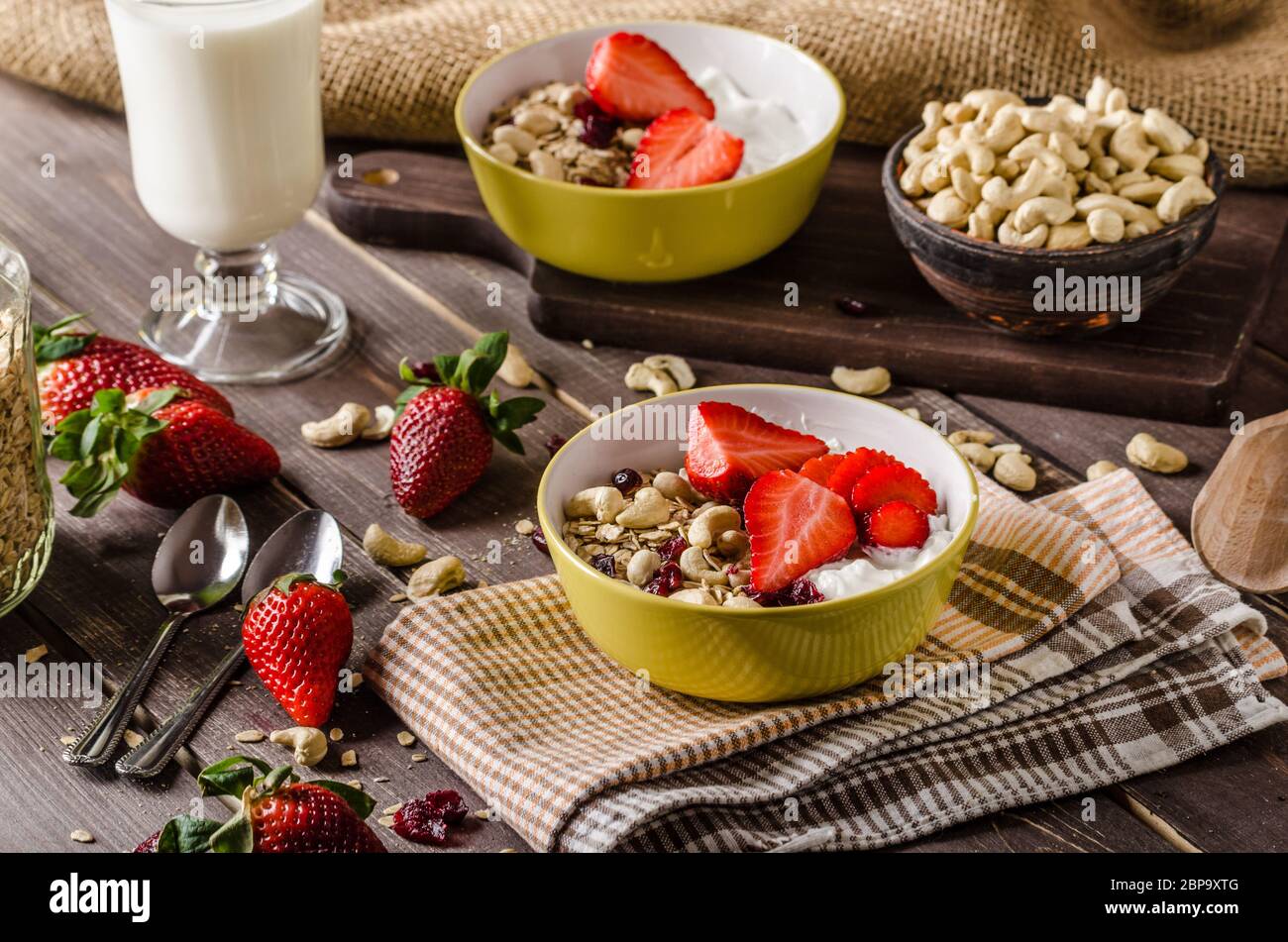 oatmeal with yogurt, fresh strawberries and nuts, healthy breakfast full of vitamins Stock Photo ...
