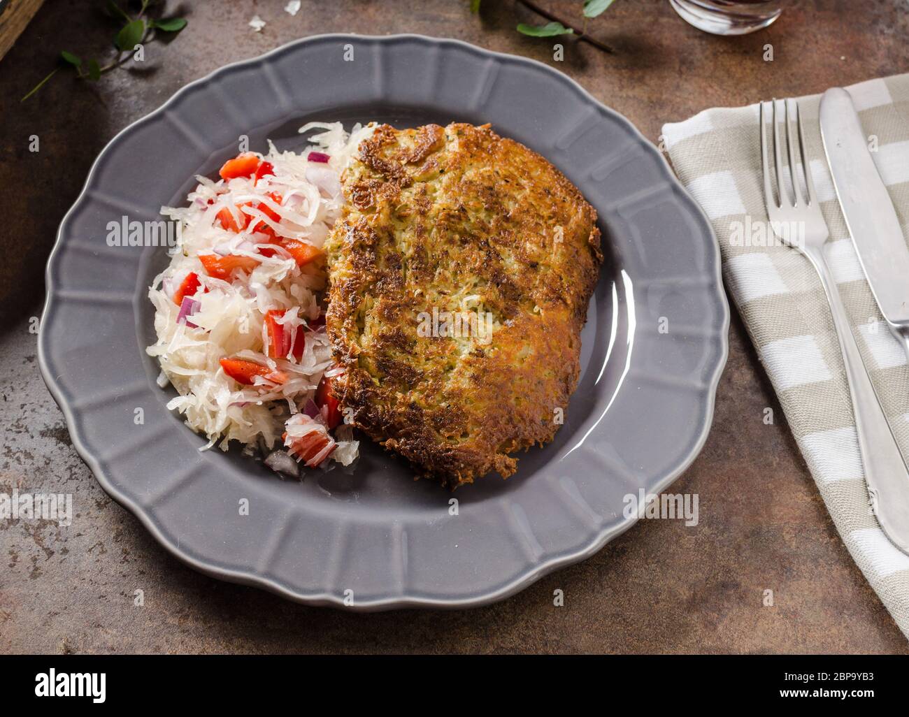 Potato pancakes with coleslaw, place for your advertising Stock Photo ...