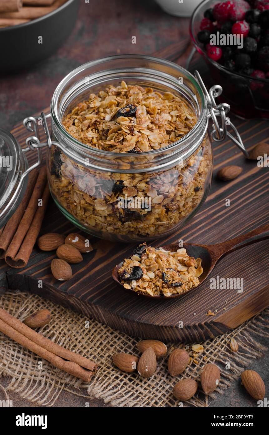 Baked granola with berries, delish simple meal Stock Photo - Alamy