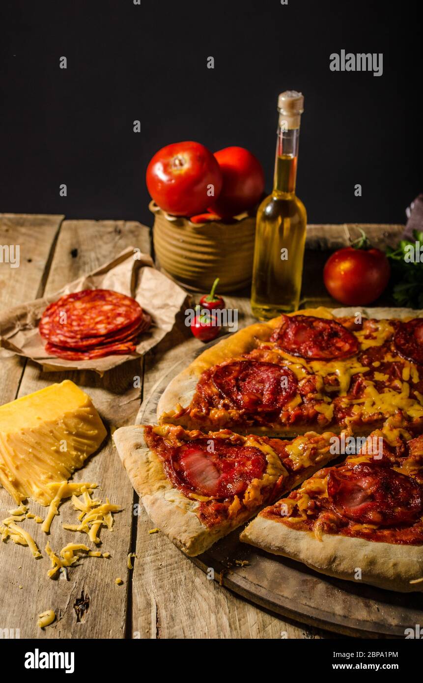 Rustic salami pizza with cheddar cheese and chorizo, delicious chorizo ...