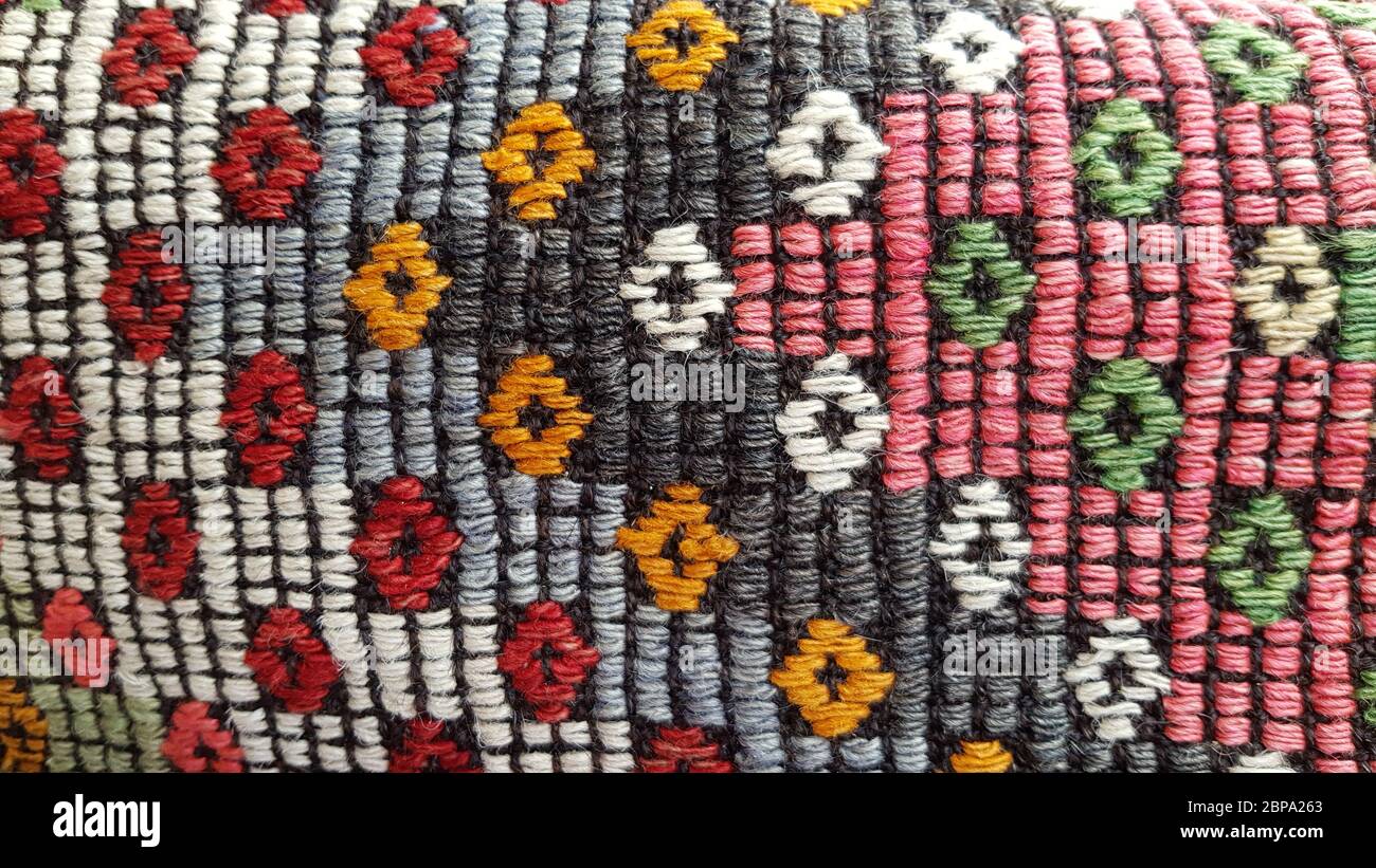 Colorful geometric rhombus pattern on handmade weaved rug. Turkish ...