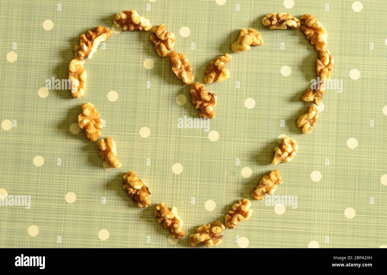 Peeled California Walnut Kernel On Blue Background With White Dots ...