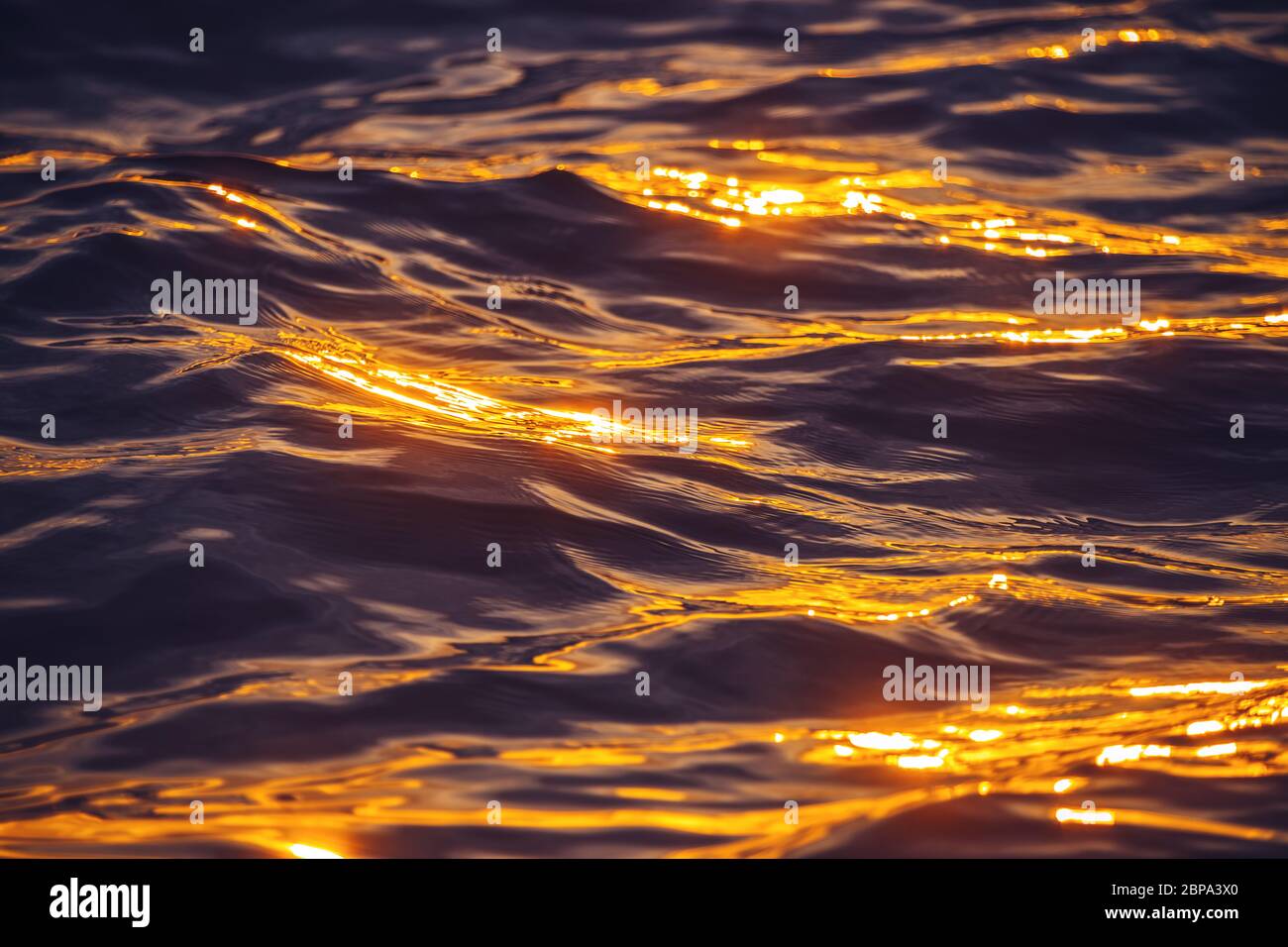 Sea sunset. Ocean Ripples waves as water texture background Stock Photo ...