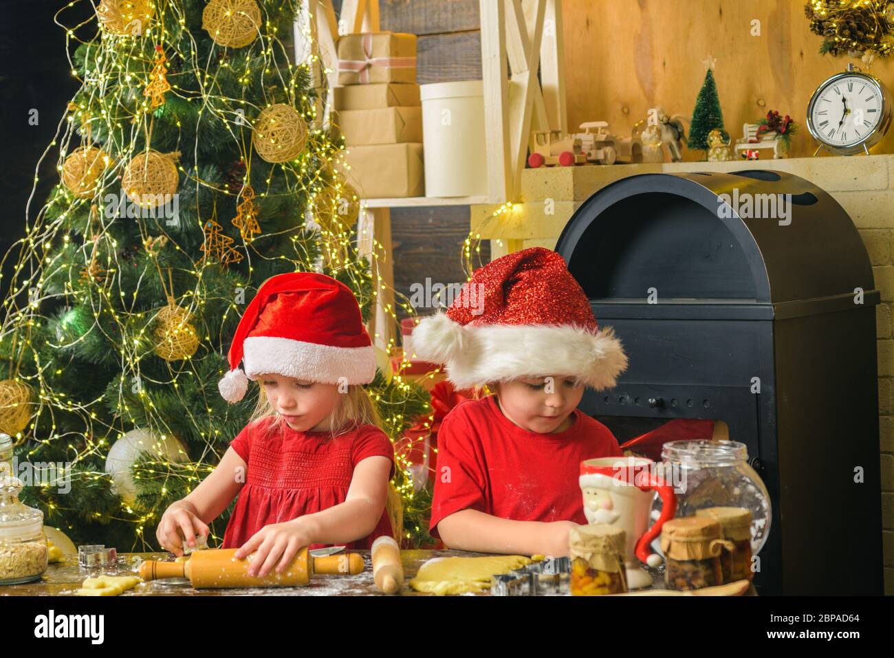 Family Christmas traditions. Kids making christmas cookies. Happy ...