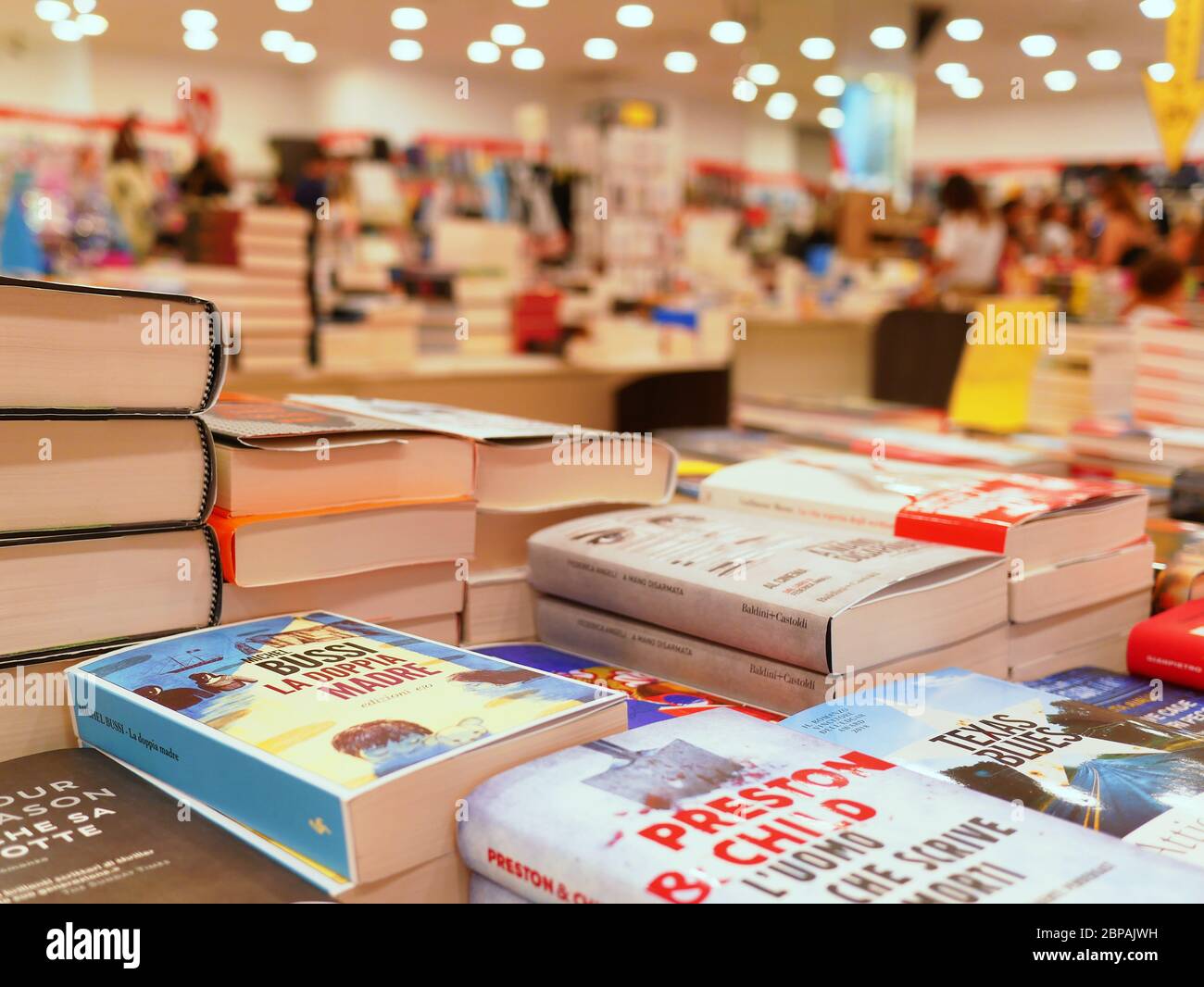 Milan, Italy - 2019 August: Piles of books on sale at modern bookshop ...