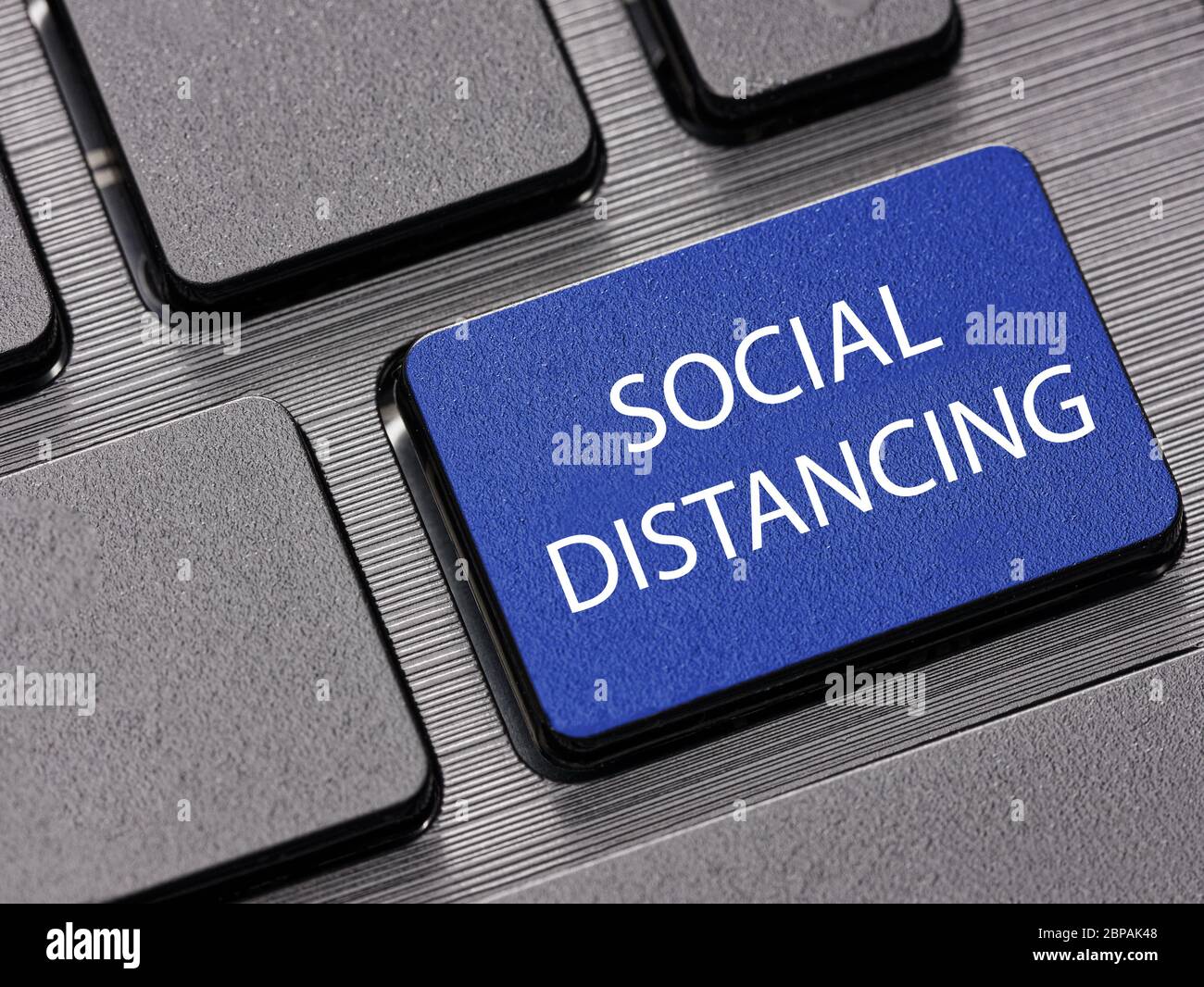 Social Distancing key on computer keyboard warning message concept ...