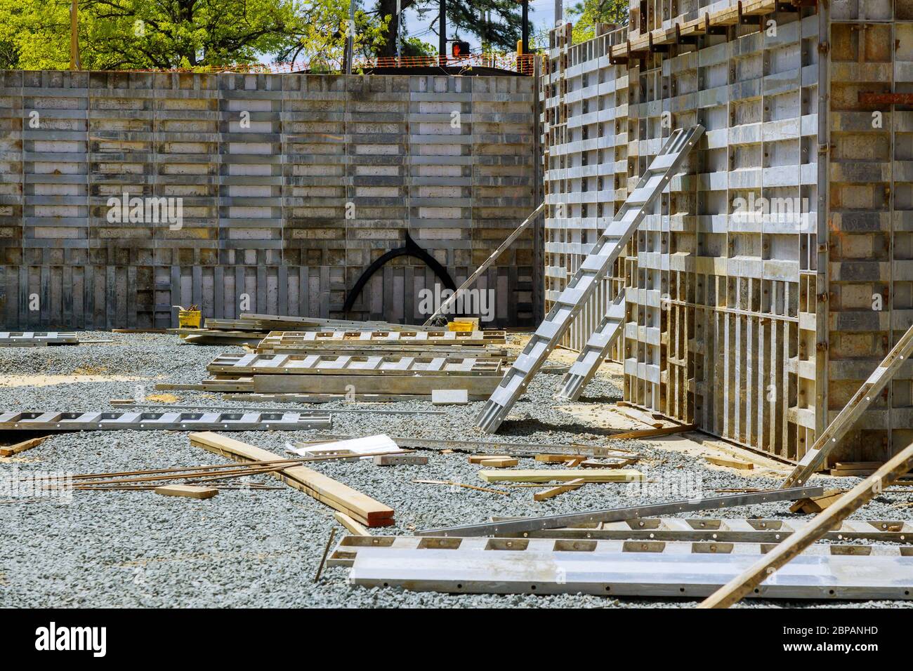 Installation of formwork under the foundation of a new house of a ...