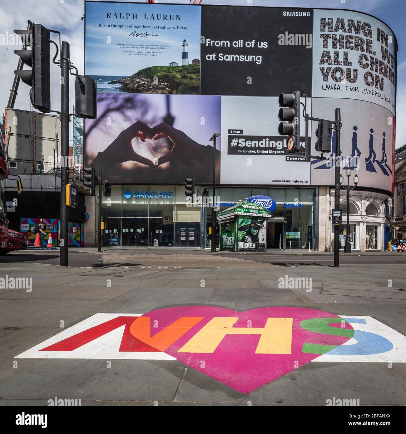 Love for the NHS as life slowly returns to Piccadilly Circus in London ...