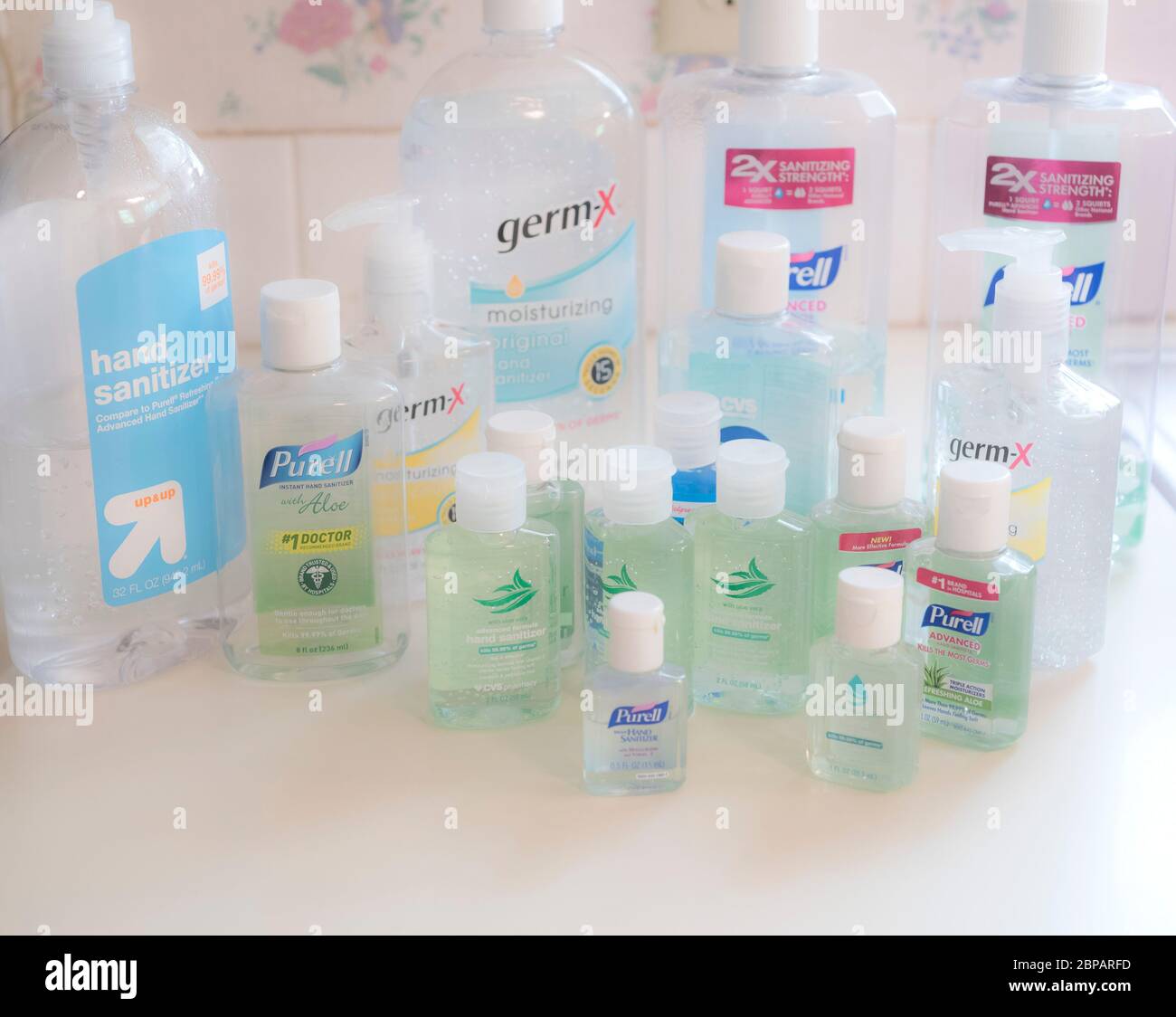 Collection of different brands of hand sanitizer by an elderly couple ...