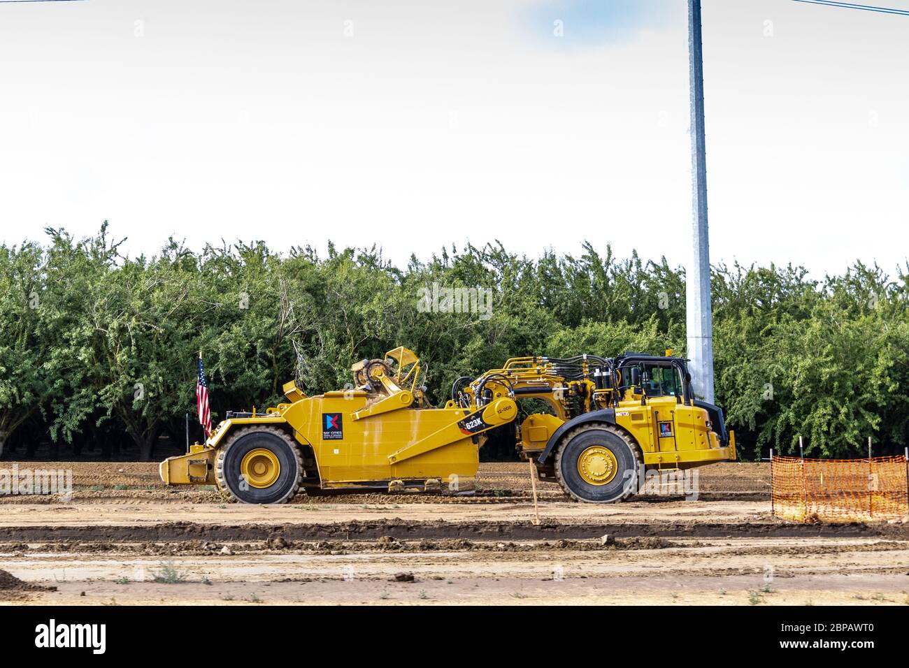 A Caterpillar 623K earth mover working on the rerouting of Highway 132 ...