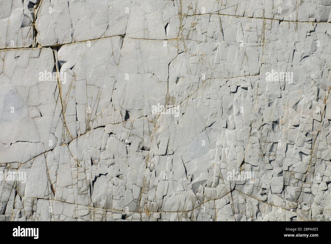Concrete grey rock texture wall with small stones. Textural natural ...