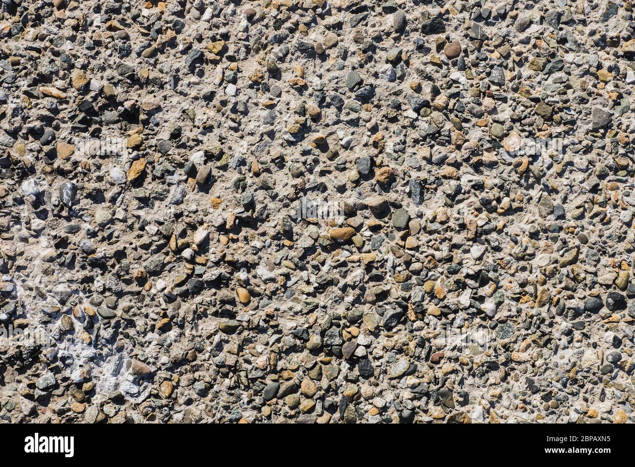 Concrete grey rock texture wall with small stones. Textural natural ...