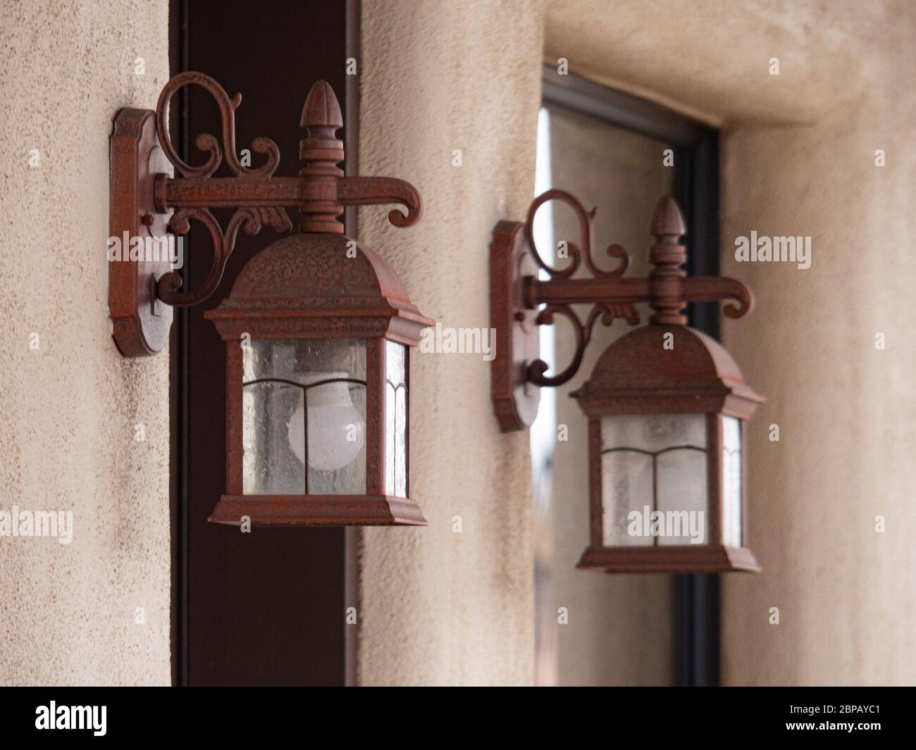 Rusty metal outdoor electric lights Stock Photo - Alamy
