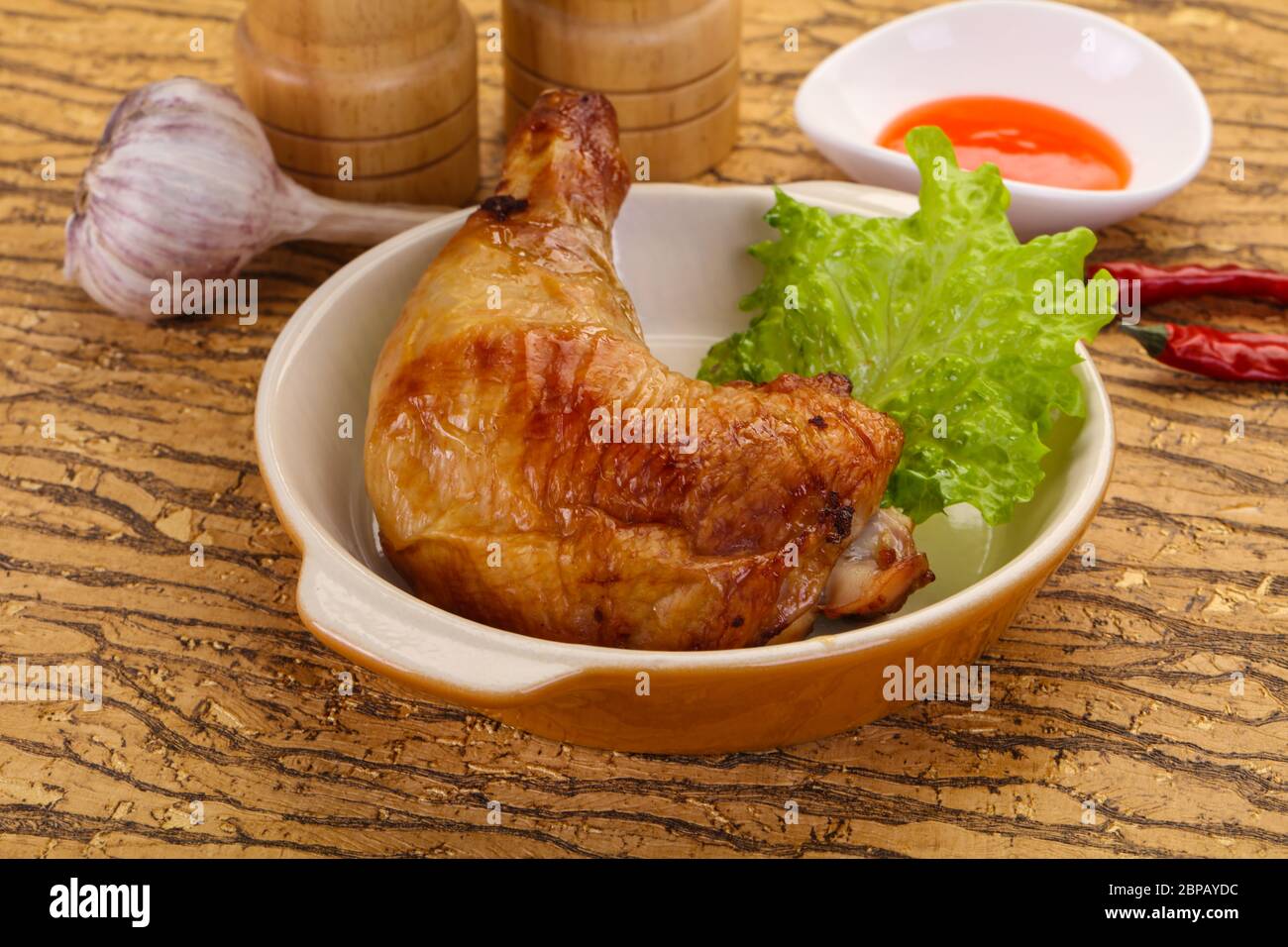 Crispy tasty Roasted chicken leg Stock Photo - Alamy