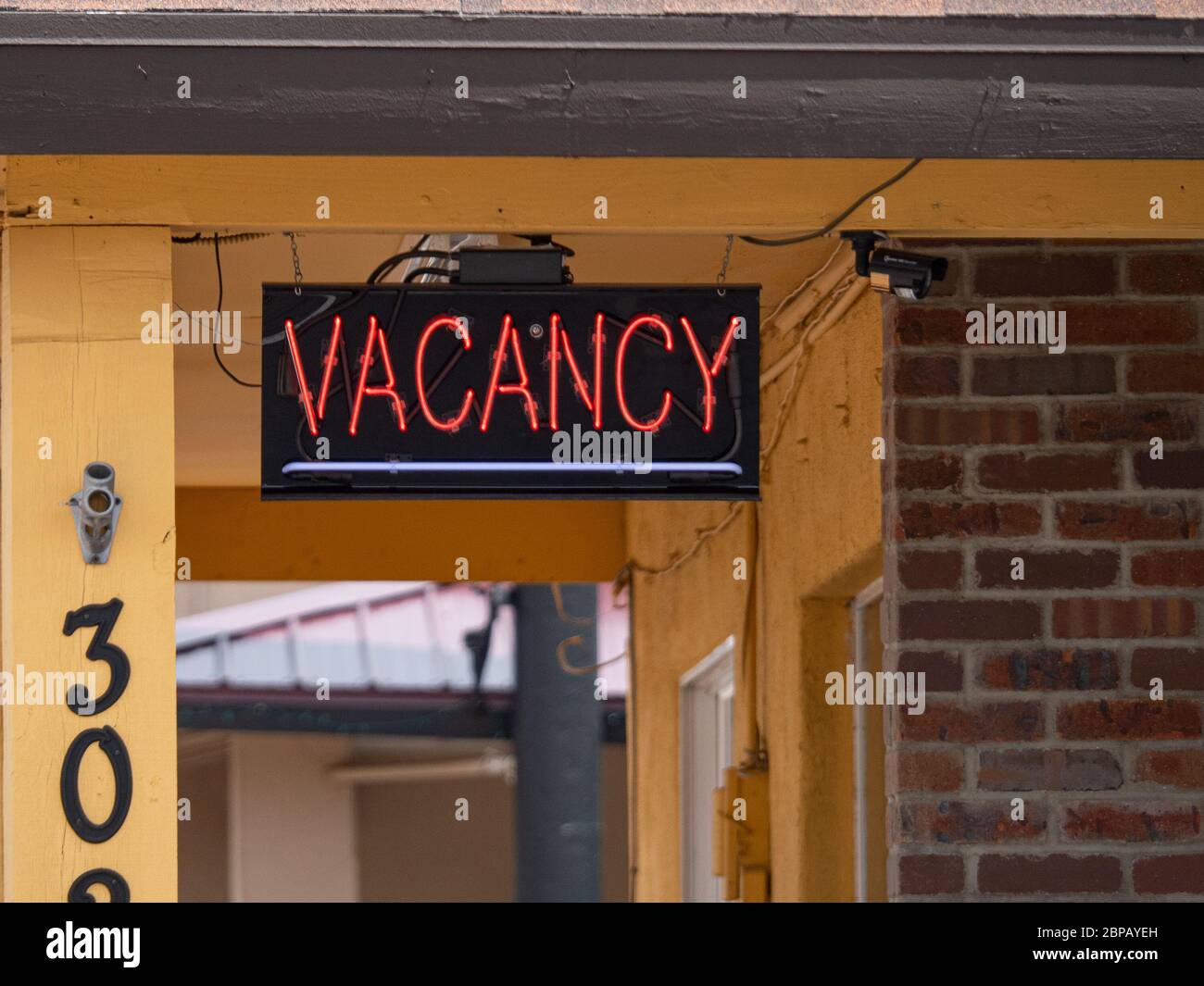 Neon lit vacancy sign Stock Photo - Alamy
