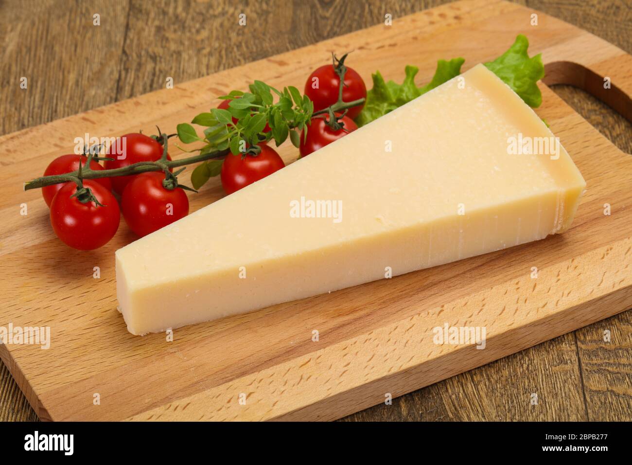 Italian traditional parmesan cheese triangle served salad Stock Photo ...