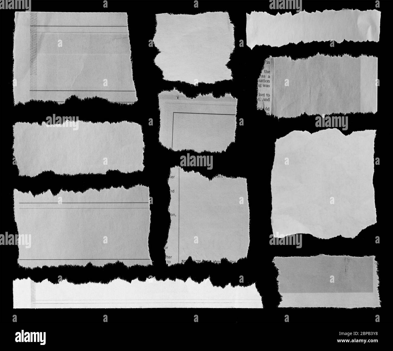 Eleven pieces of torn newspaper on black background Stock Photo - Alamy