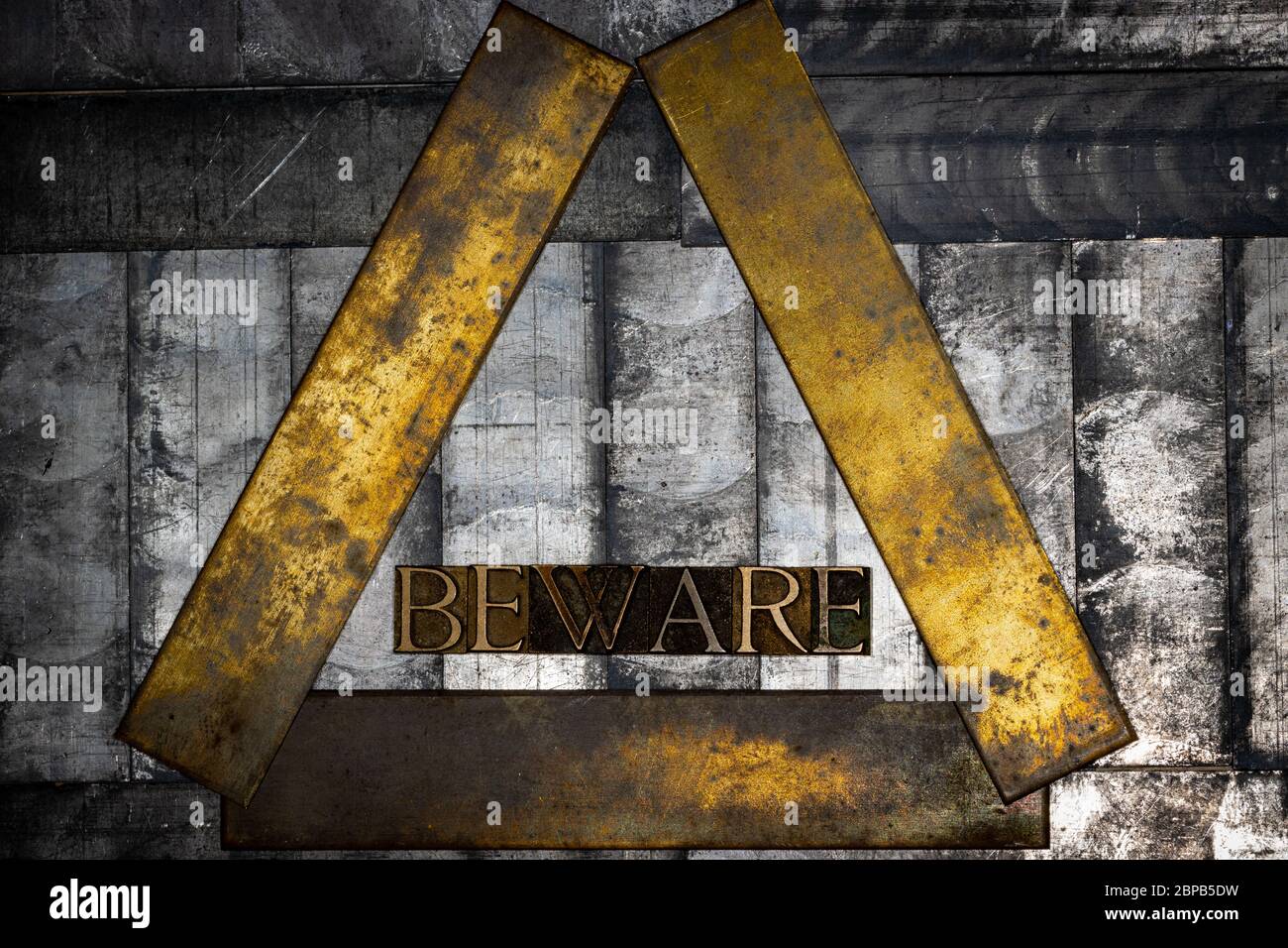 Photo of real authentic typeset letters forming Beware text on vintage ...