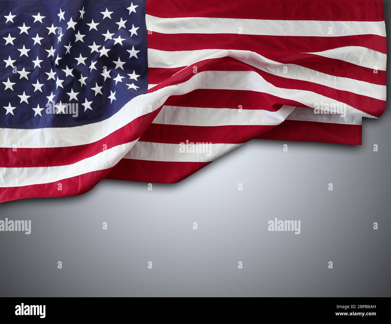 American flag on grey background Stock Photo - Alamy