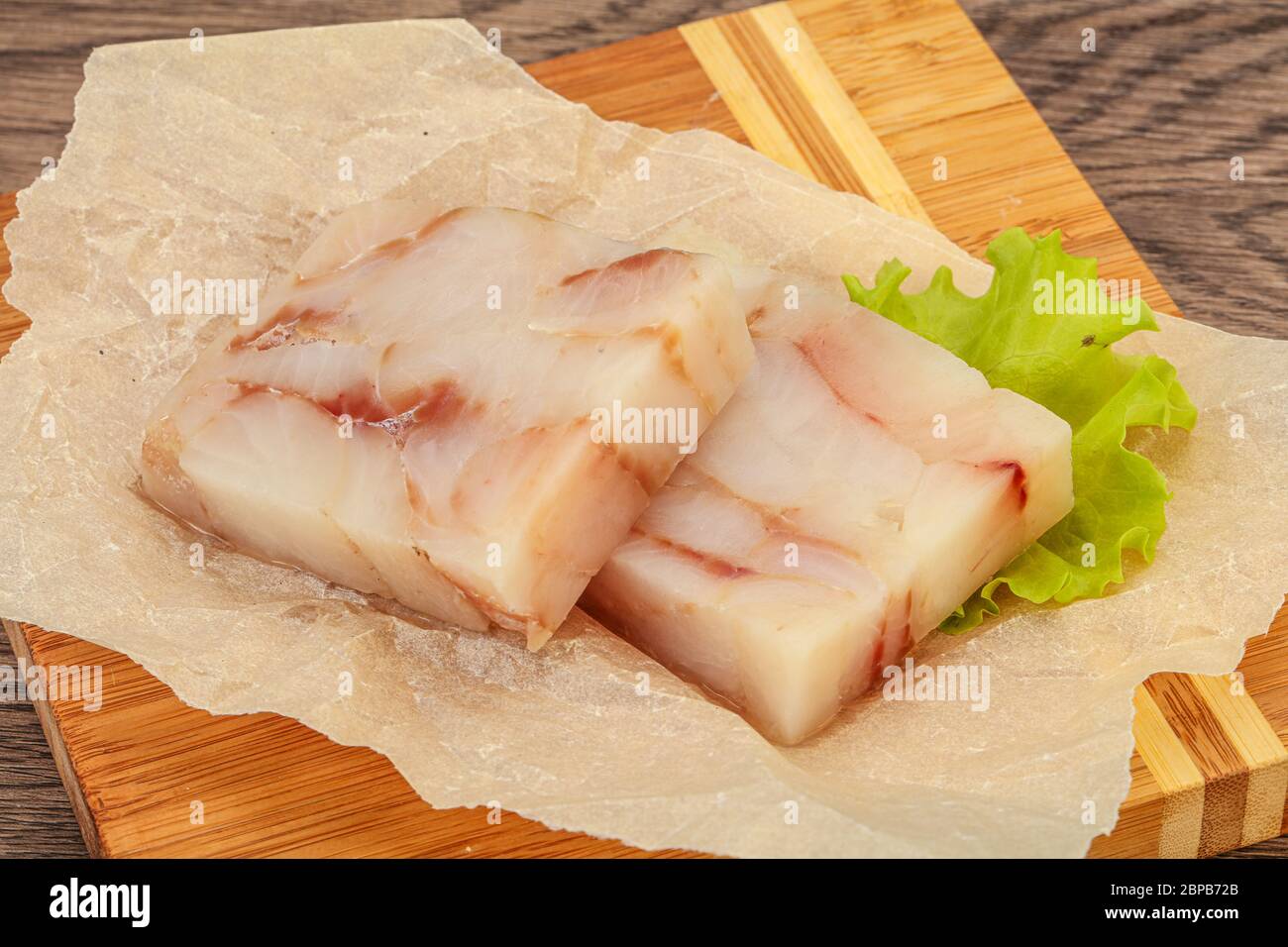 Raw dietary pollock fish fillet for cooking Stock Photo - Alamy