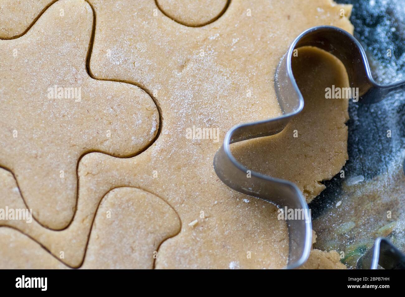 Ginger bread men biscuits being made Stock Photo - Alamy