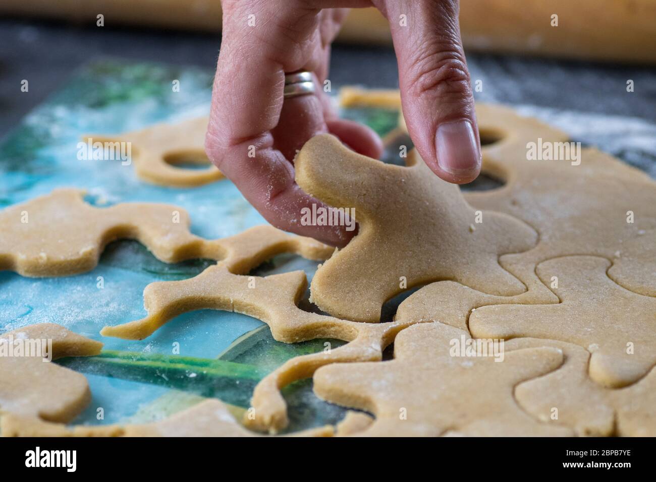 Ginger bread men biscuits being made Stock Photo - Alamy