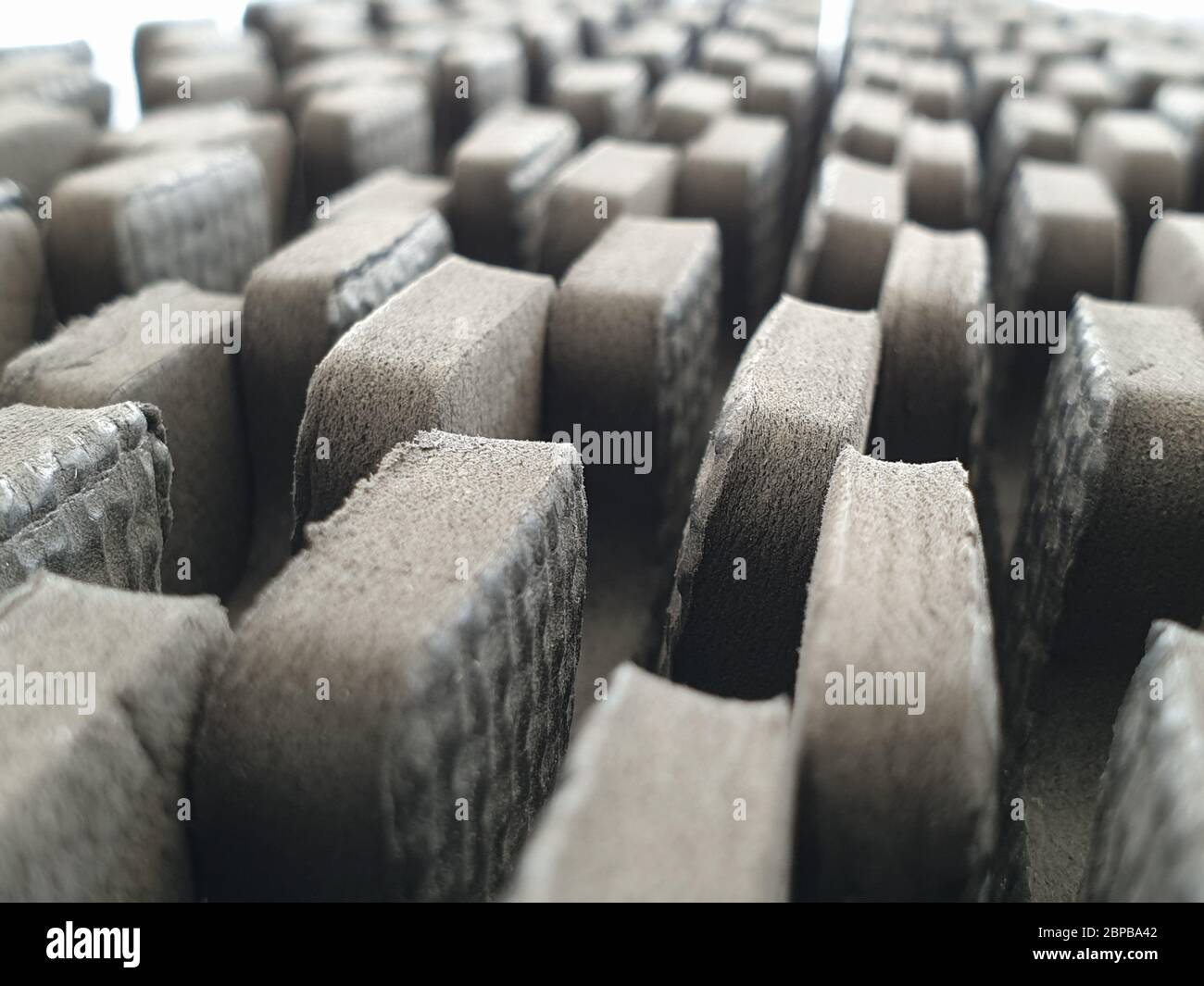 Abstract texture of portable floor tiles connectors Stock Photo - Alamy