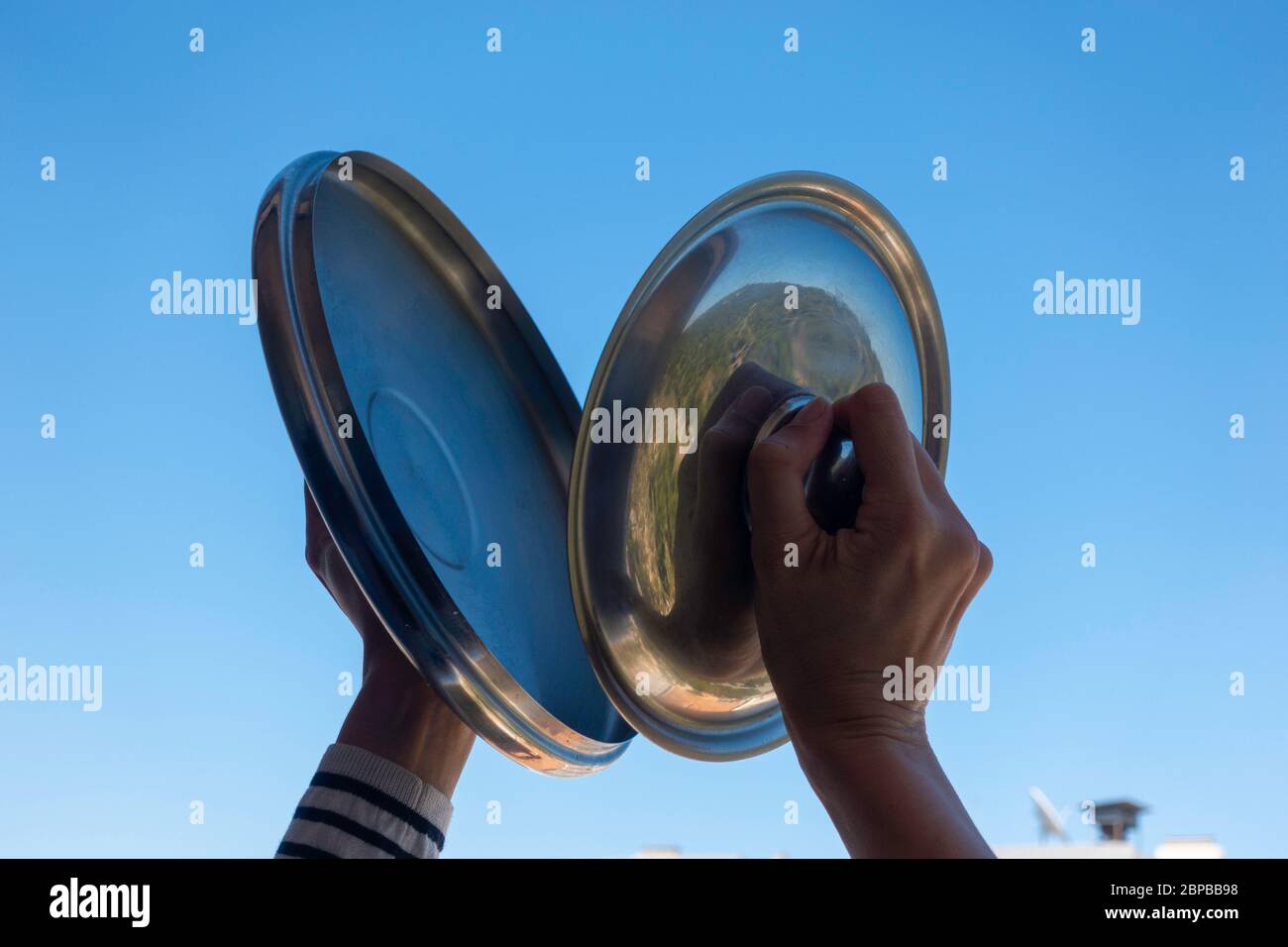 Pot banging hi-res stock photography and images - Alamy
