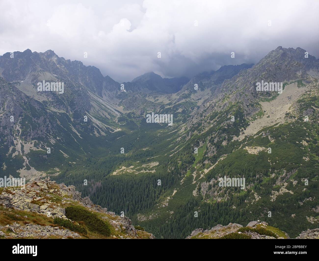 View of valley from the top of mountain Stock Photo - Alamy