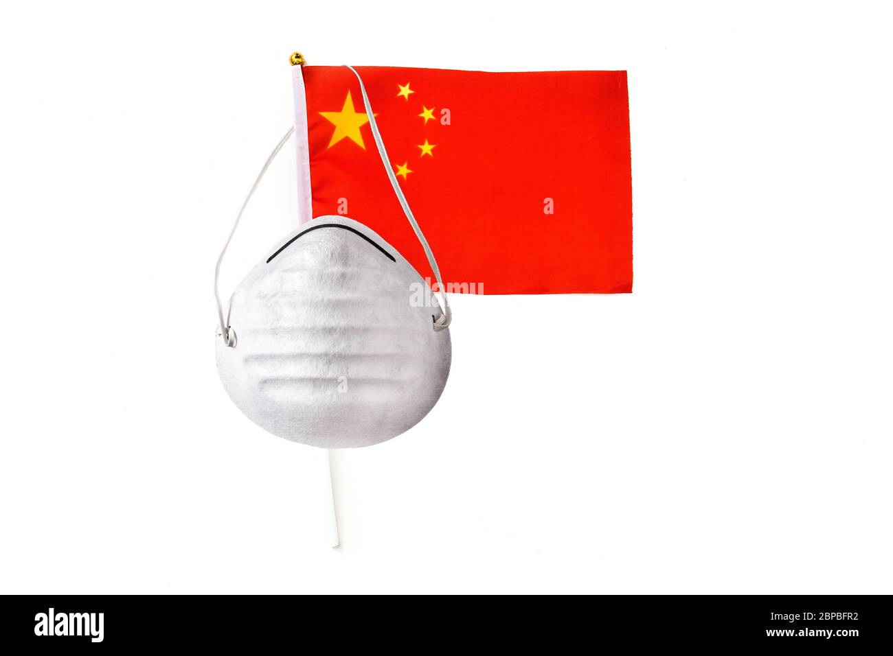 Chinese flag and protective face mask isolated on white background ...